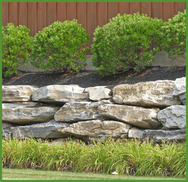 Armour Stone Retaining Wall Cost? | Brock Excavation
